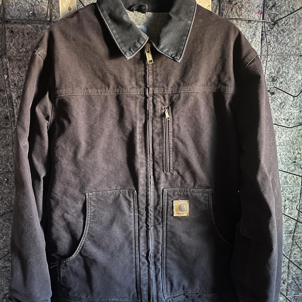 Brown Carhartt jacket with zipper pockets Looking... | Depop