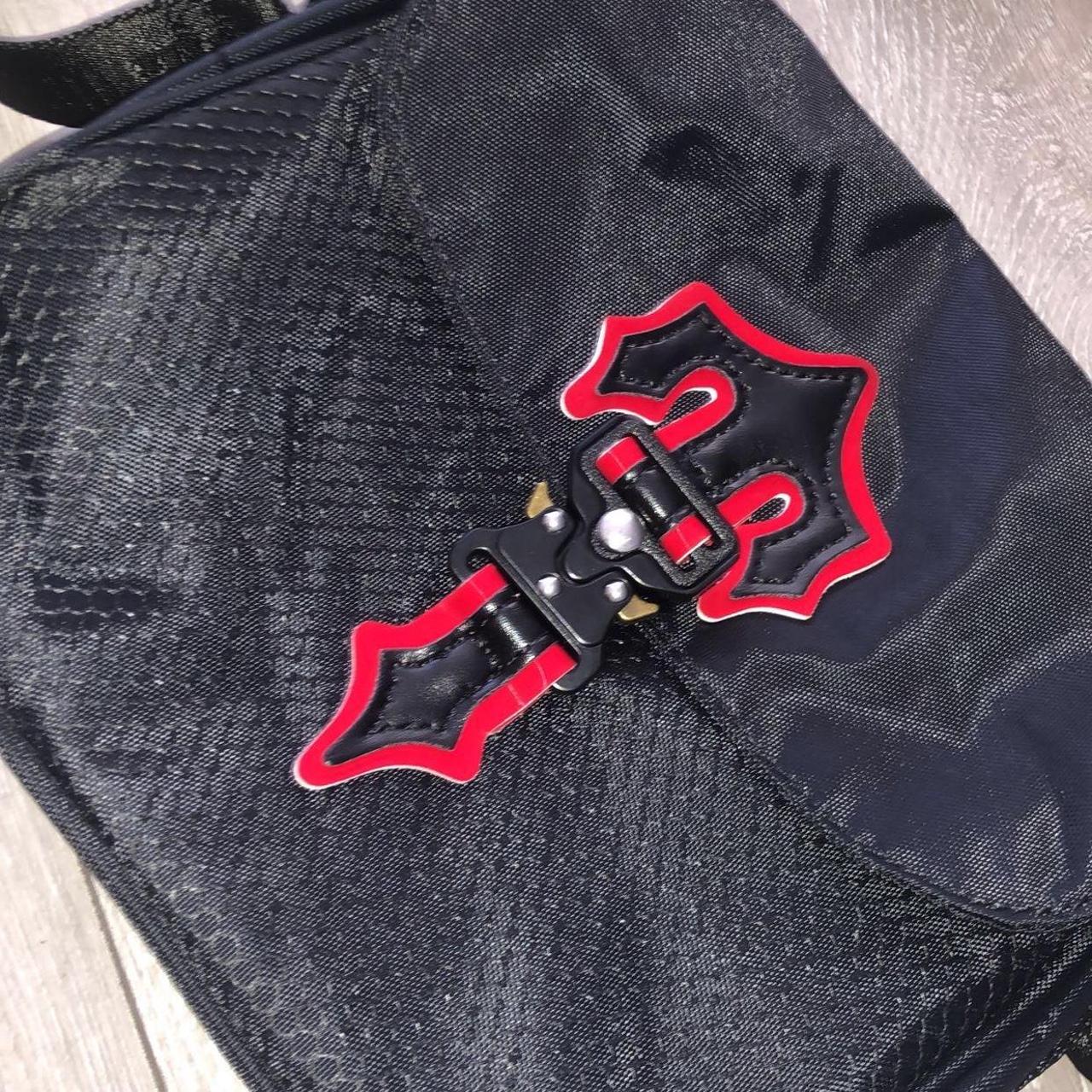 Trapstar red and black pouch brand new - Depop