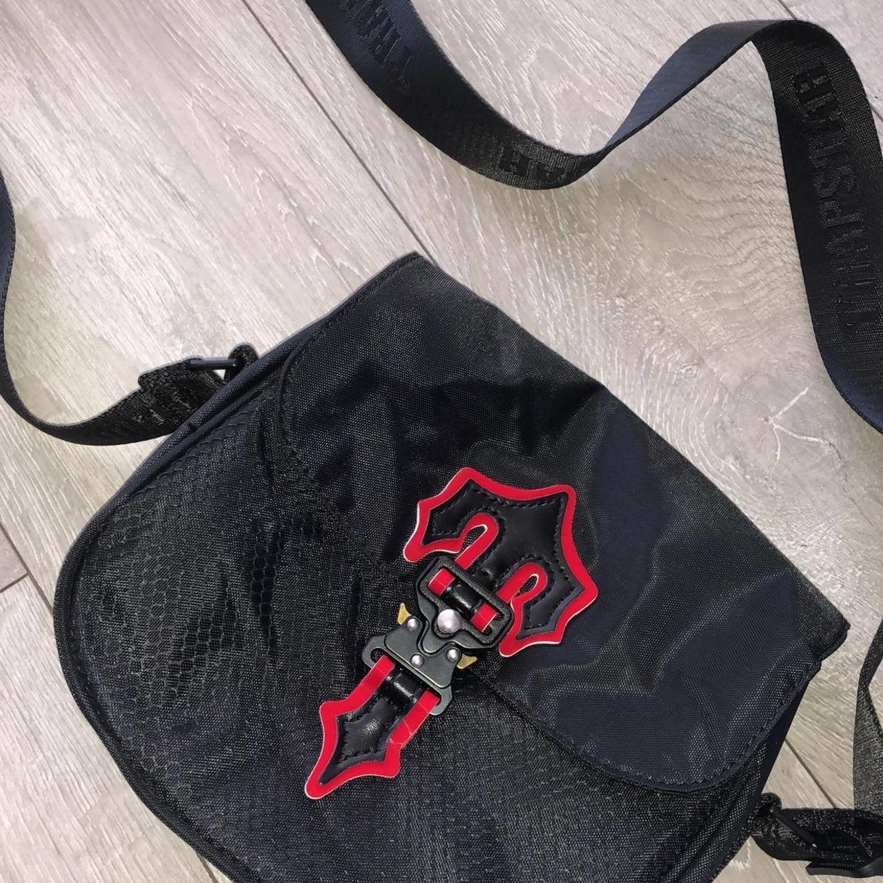 Trapstar red and black pouch brand new - Depop