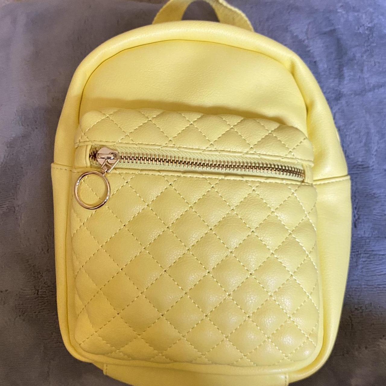 small yellow backpack, never used, more vibrant in... - Depop