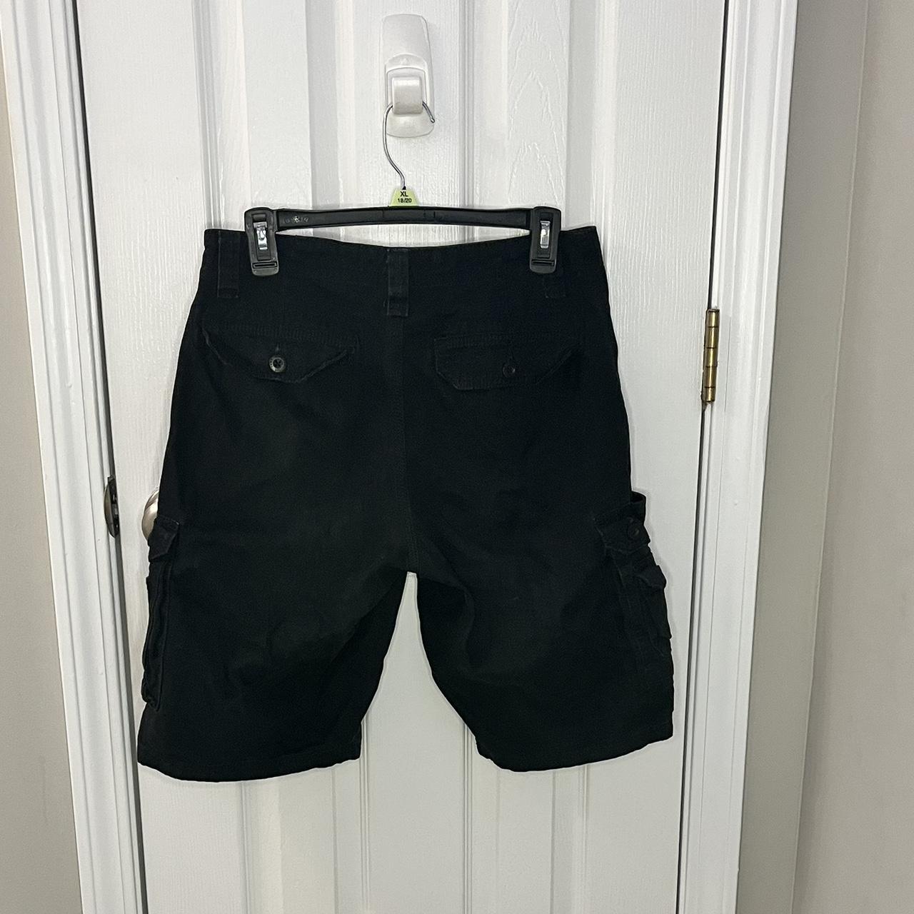 Black cargo shorts, can be paired with a cute baby... - Depop