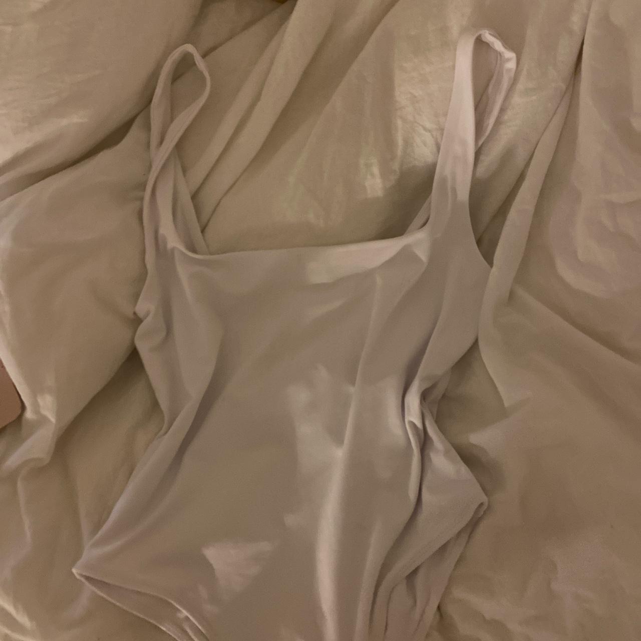 Supre white body suit Size m Clasp bottom Perfect... - Depop