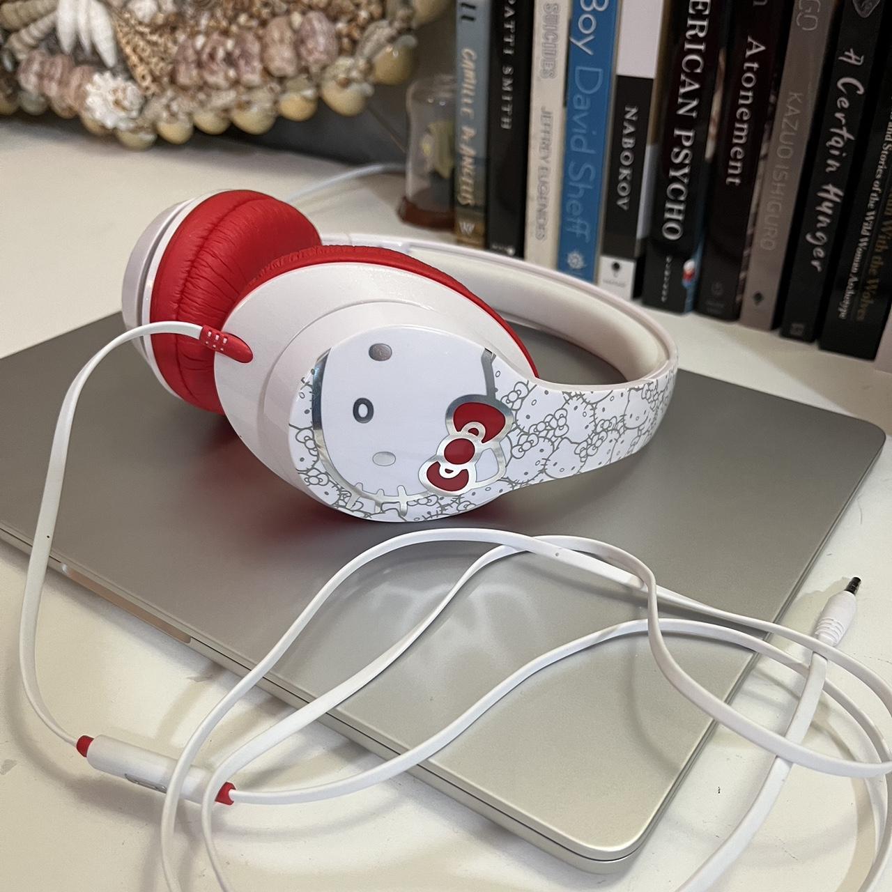 Hello kitty headphones over the ear White has a... - Depop