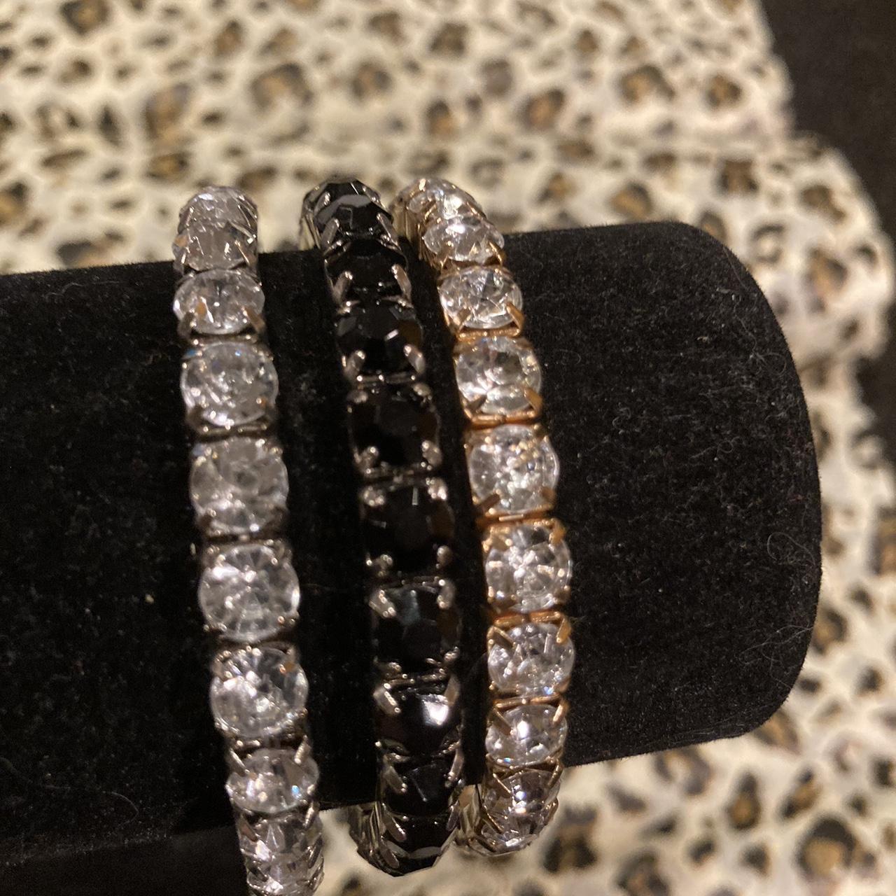 Stack of 3 rhinestone bracelets with black and clear... | Depop