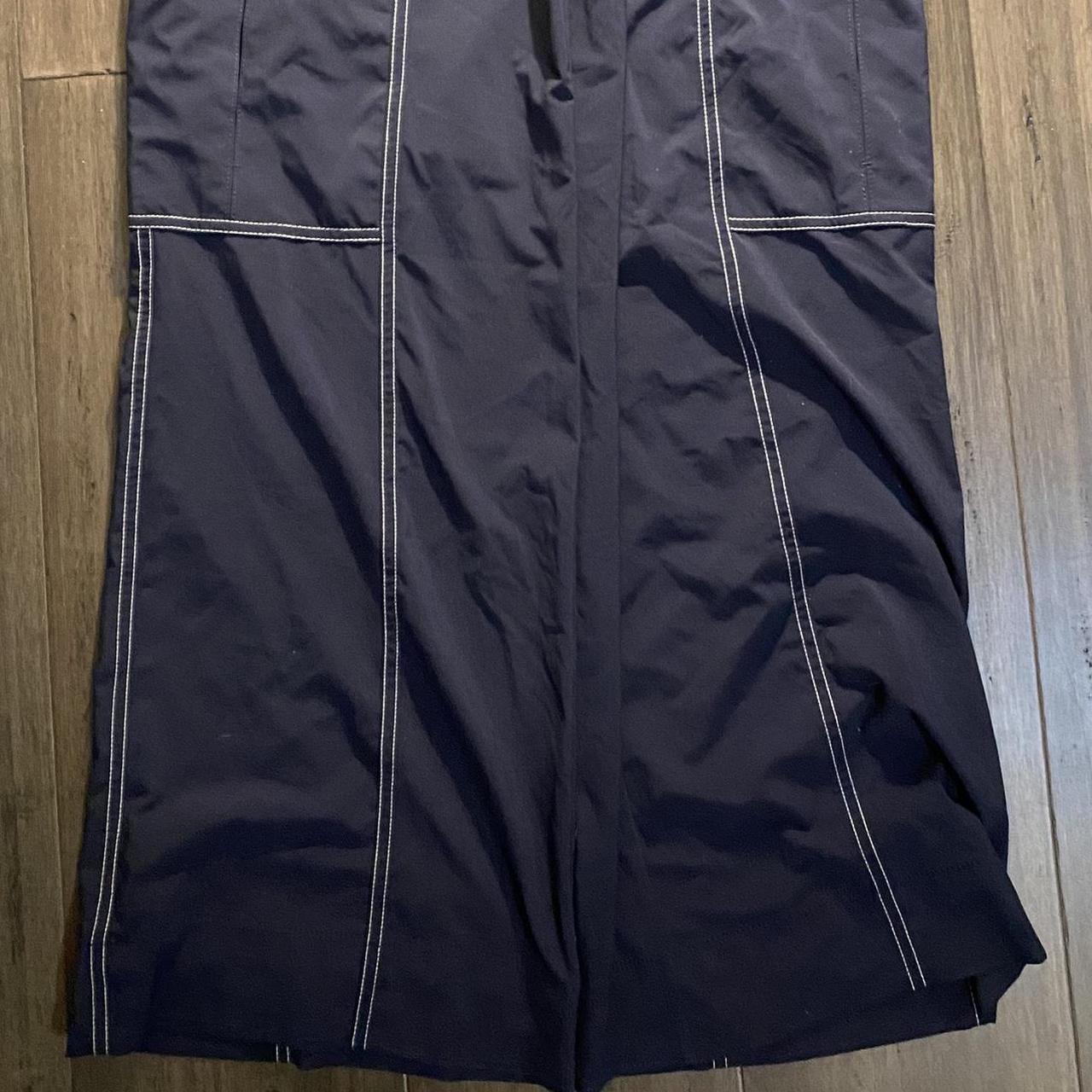 Athleta navy blue cargo pants with white stitching... - Depop