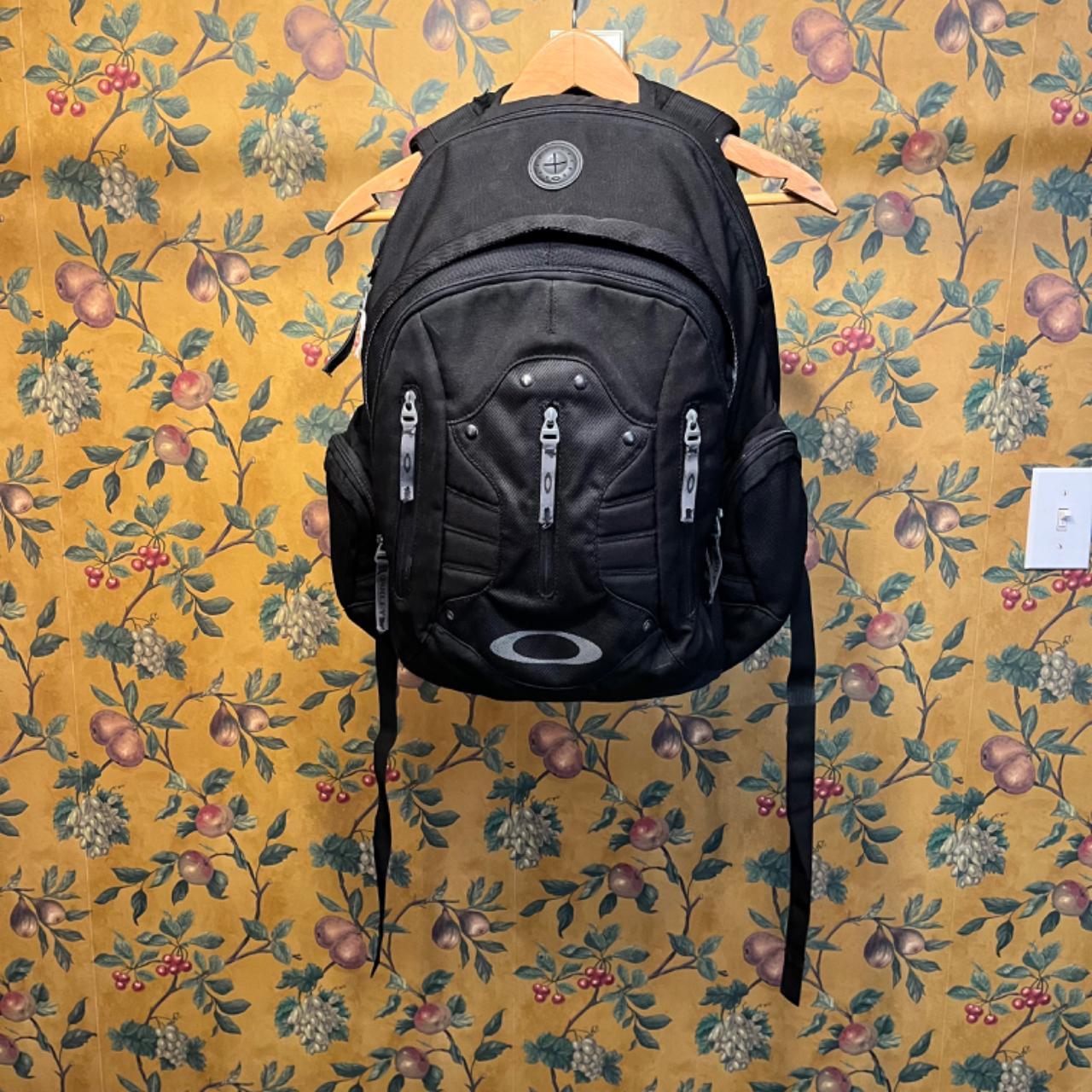 2000s Oakley utility backpack Tiny rip where strap... - Depop