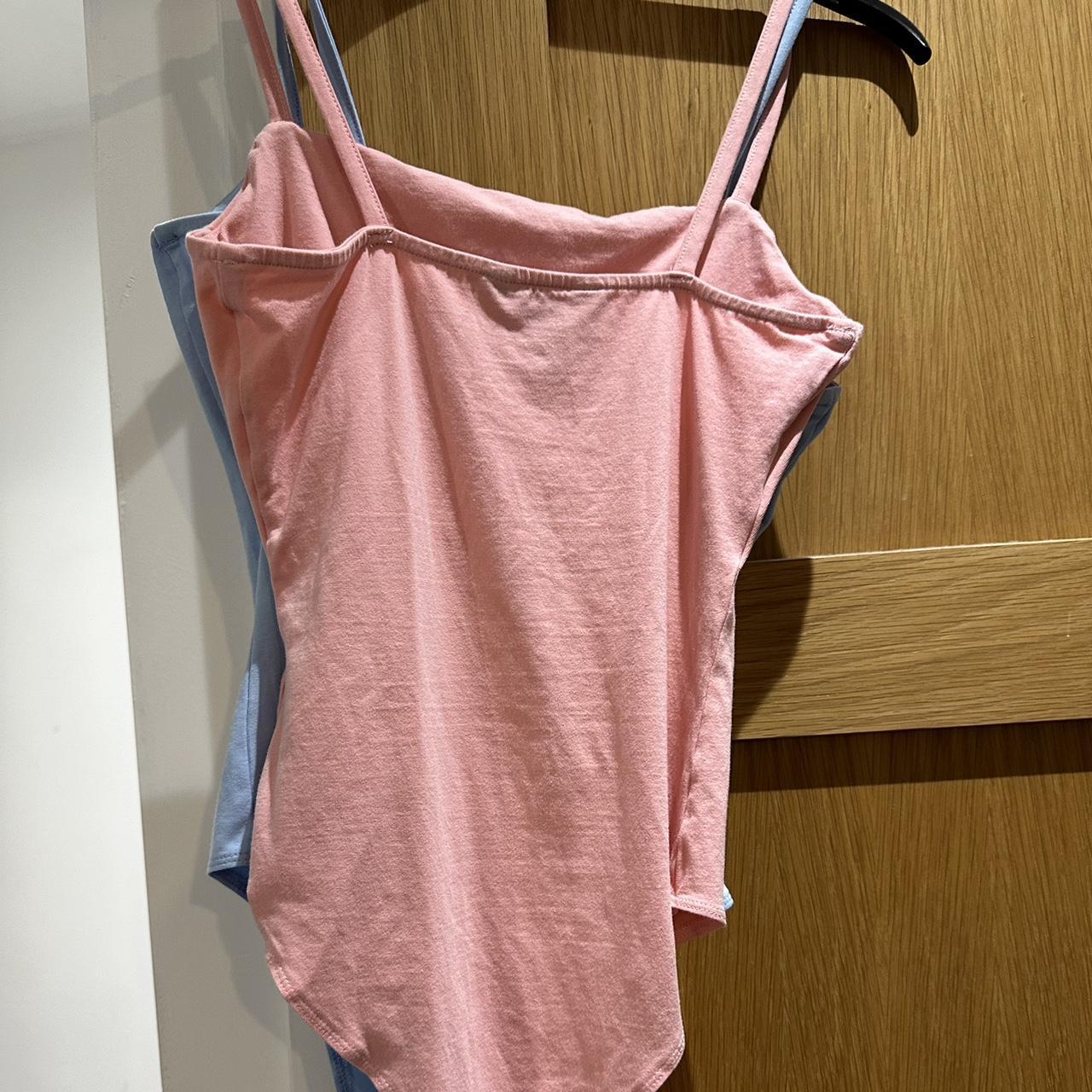Set of two Blue & pink body suits Newlook Never... - Depop