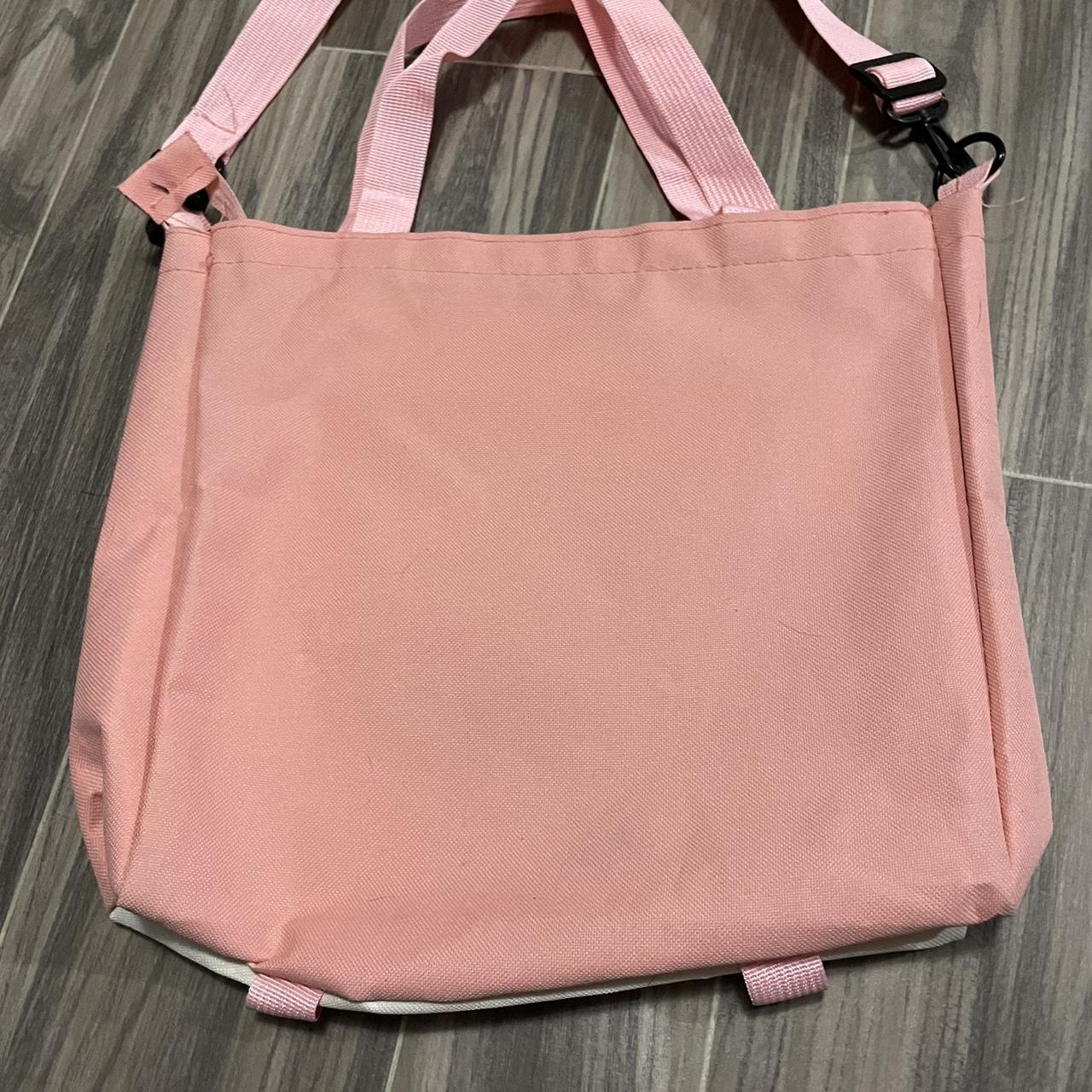 Pink messenger bag Medium sized but would be great... - Depop