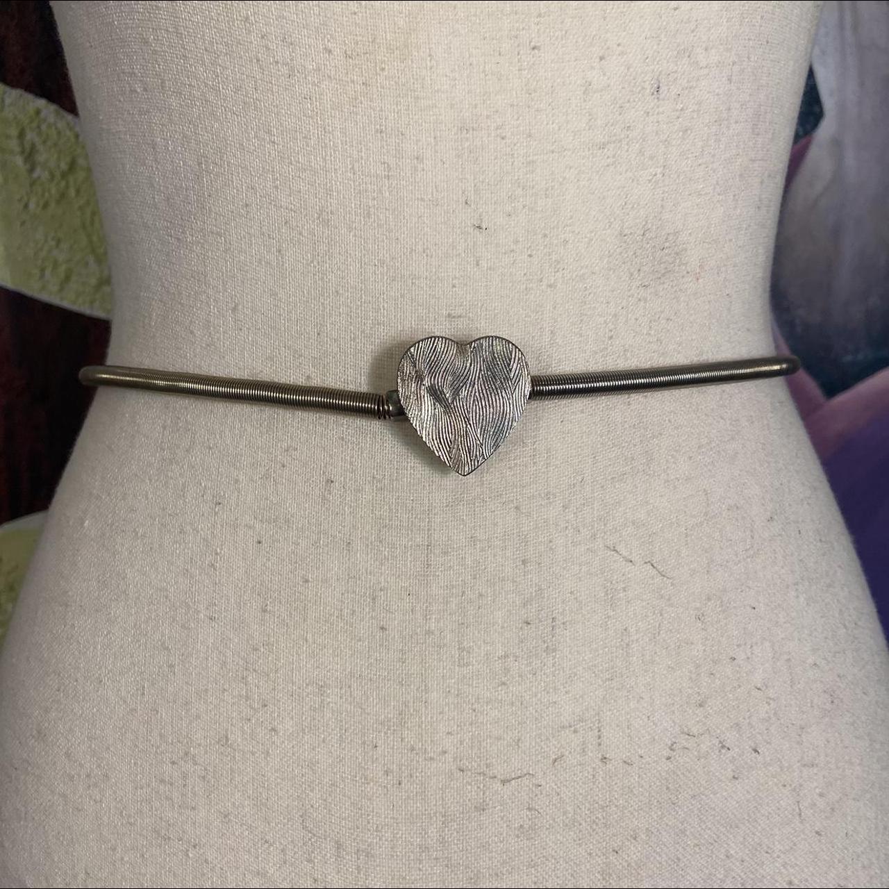 Stretchy silver heart belt! In excellent vintage... - Depop