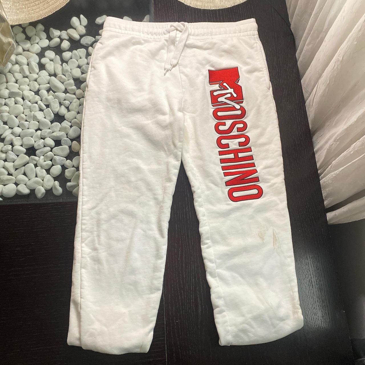 White and red Moschino H&M collab sweatpants Size... - Depop