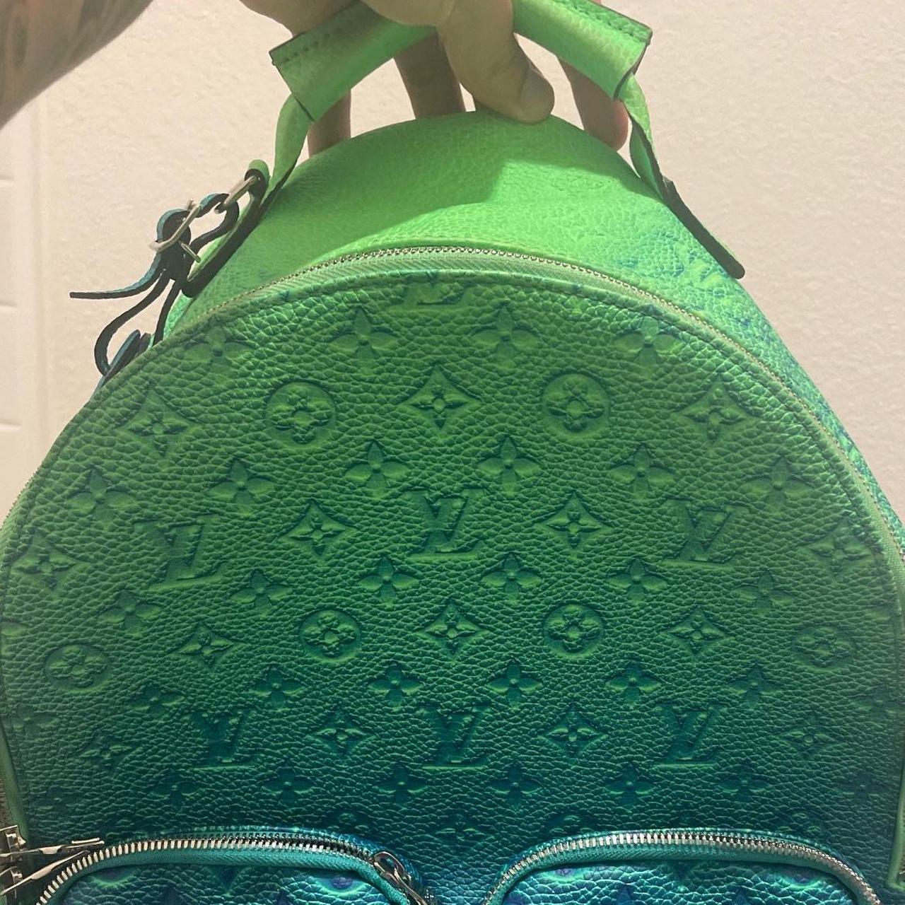 LV backpack slightly used in mint condition... - Depop