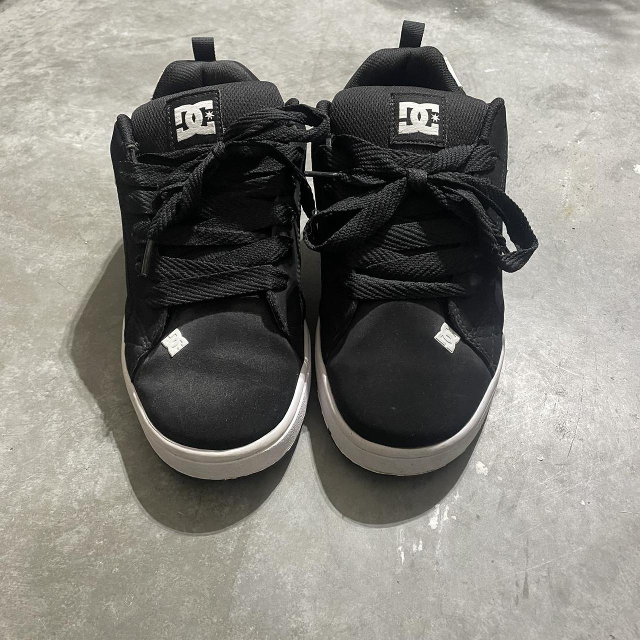 Black and white DC Shoes trainers #skateboarding... - Depop