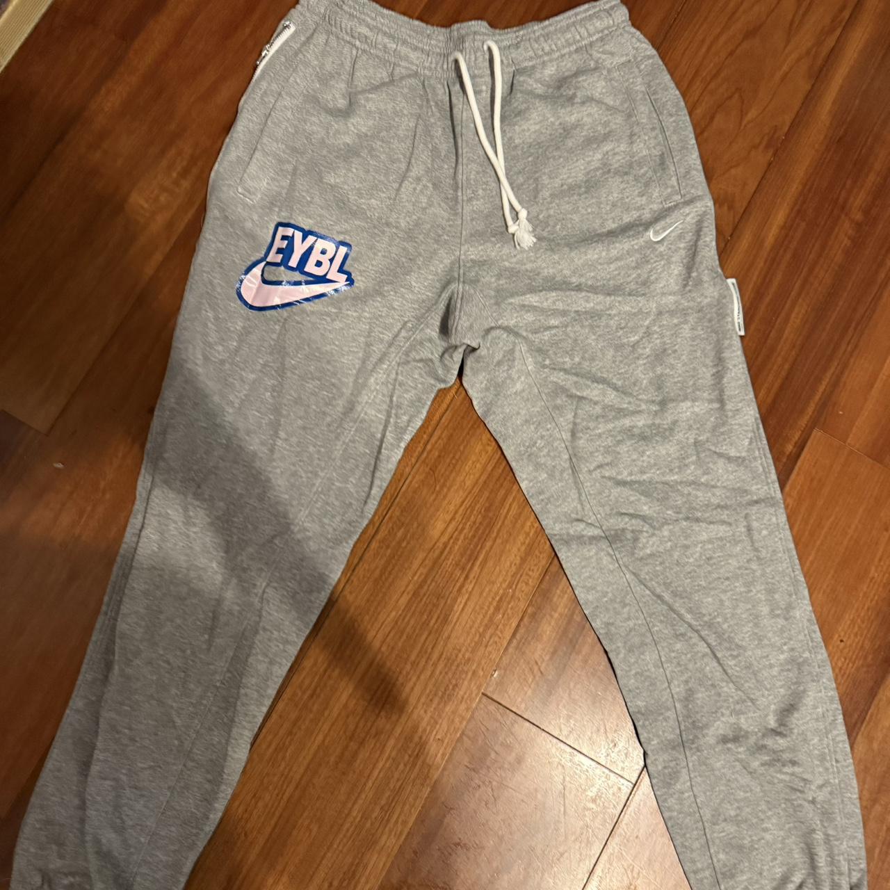 grey nike eybl pants fits like a medium but it is a... - Depop