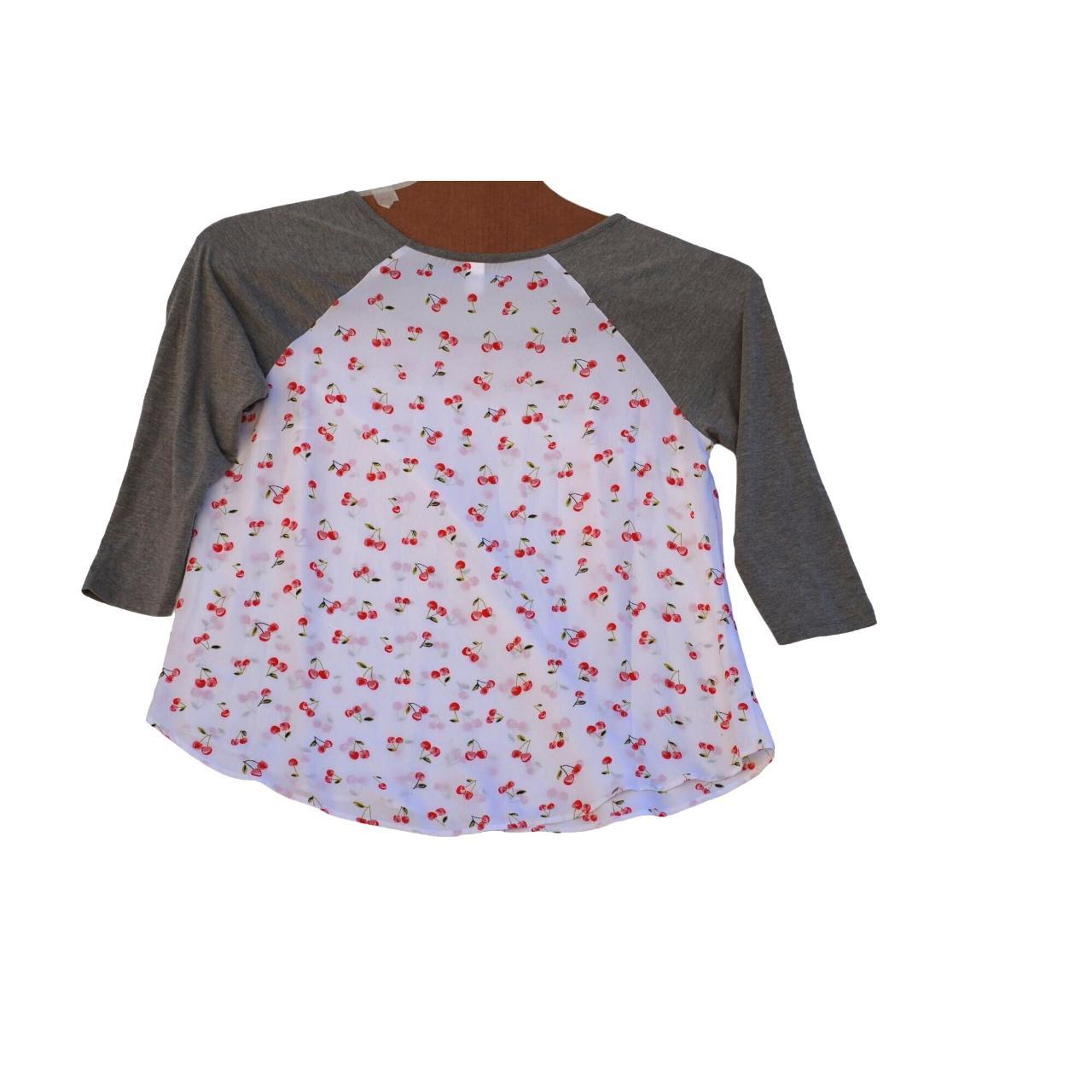 This Torrid Cherry Print Top is a chic, lightweight... - Depop