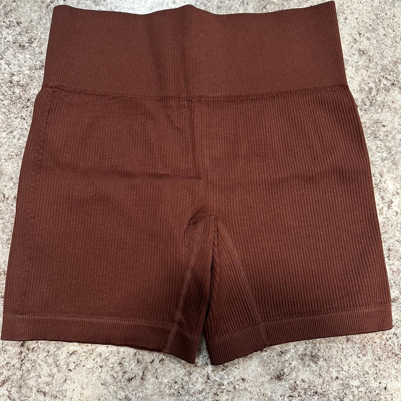 Brown/brick colored ribbed polyamide shorts from... | Depop