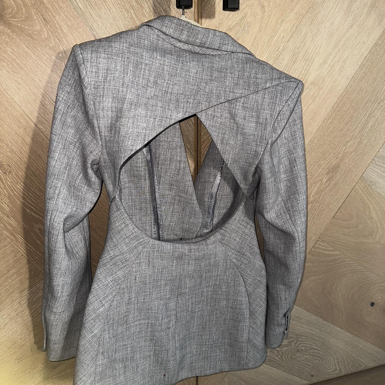 Gray backless suit never worn - Depop