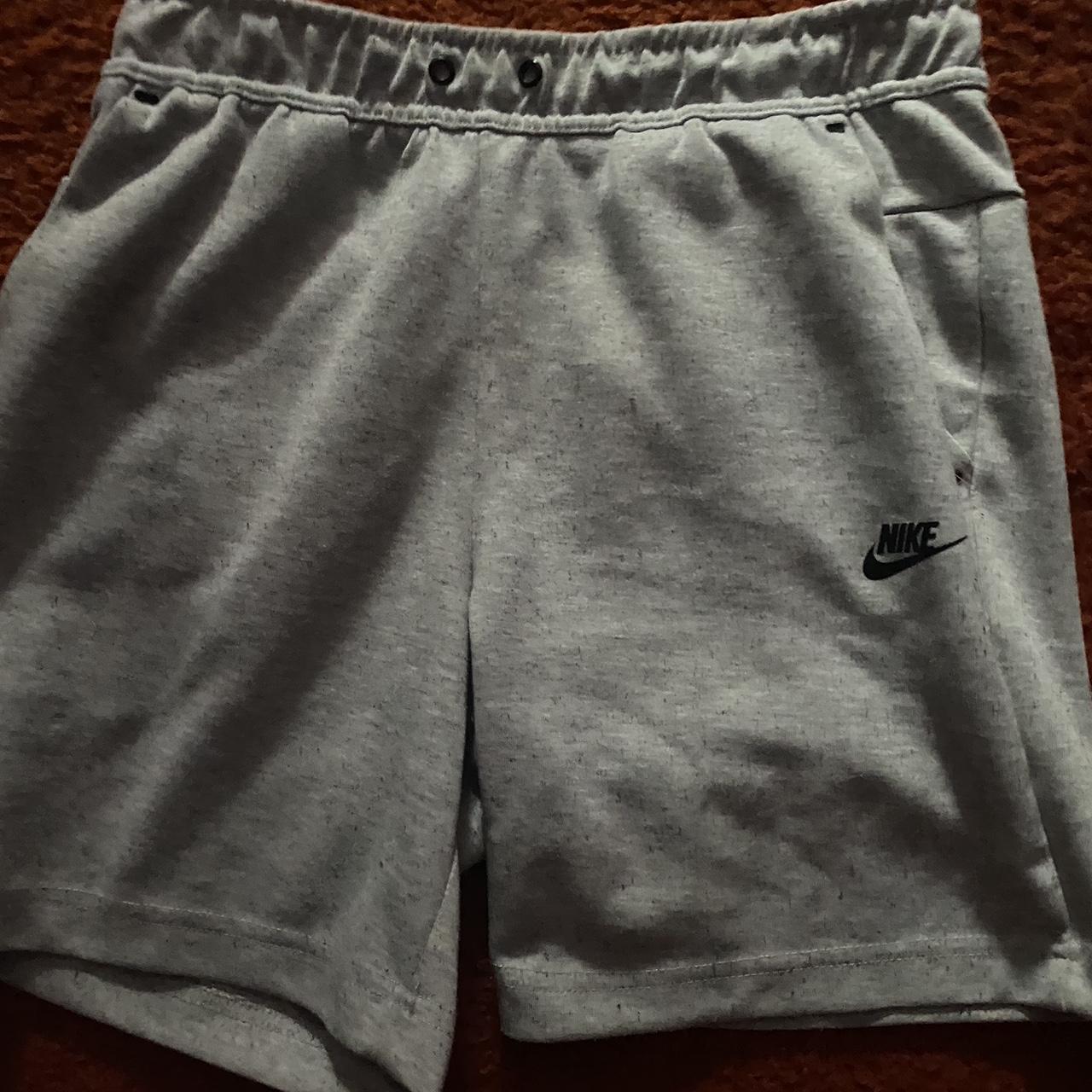 Grey Nike tech fleece shorts - Depop