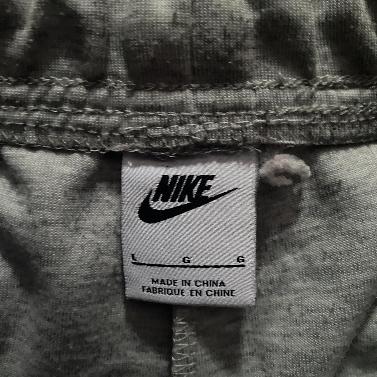 Grey Nike tech fleece shorts - Depop