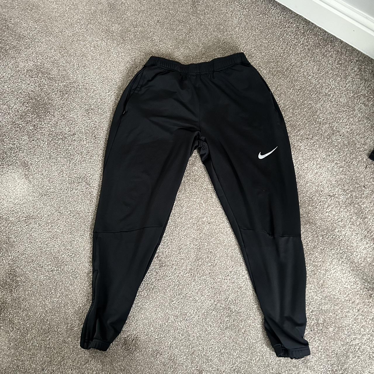 Black Nike running tracksuit bottoms Only worn a few... - Depop