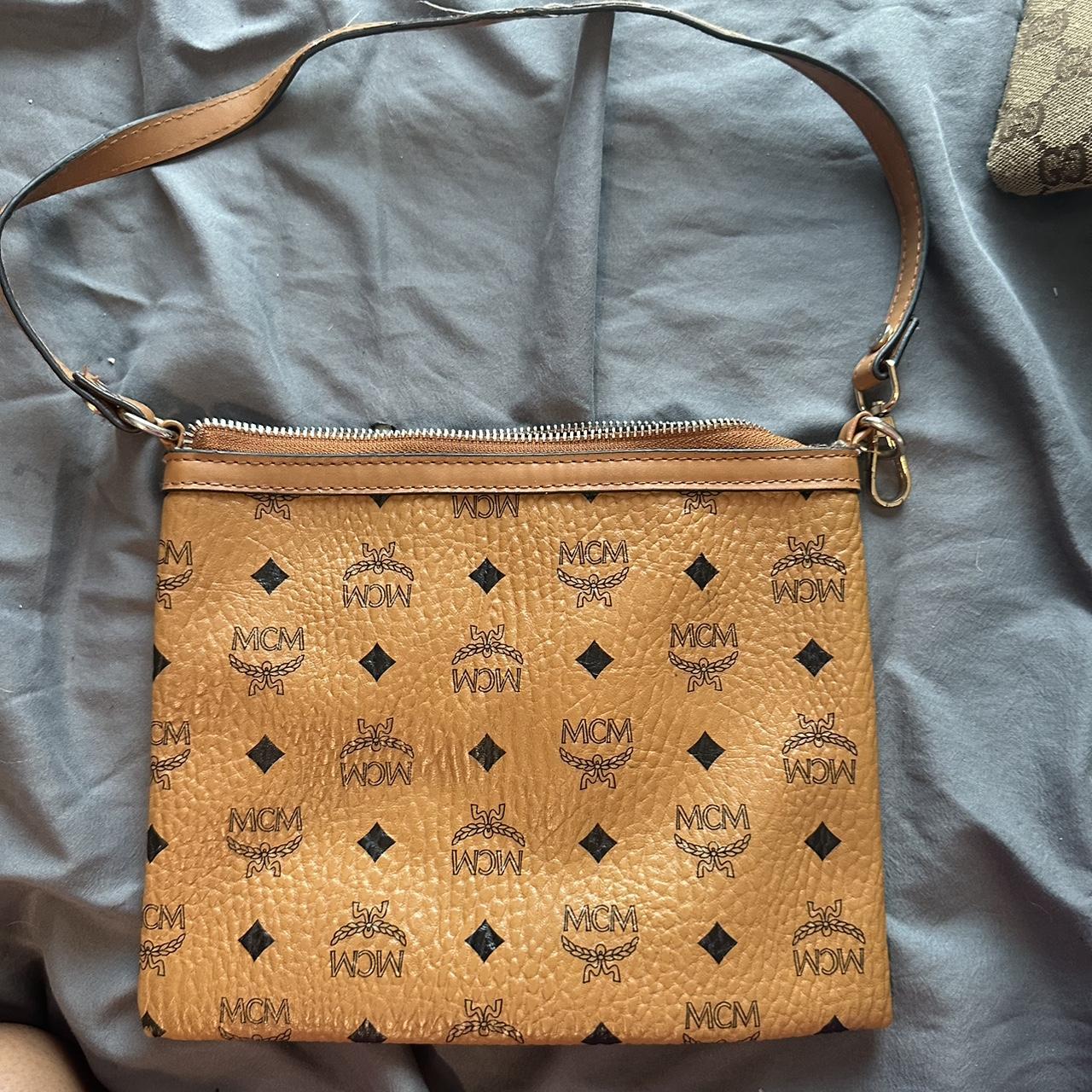 Small mcm purse Goes inside big tote, the zipper is... - Depop