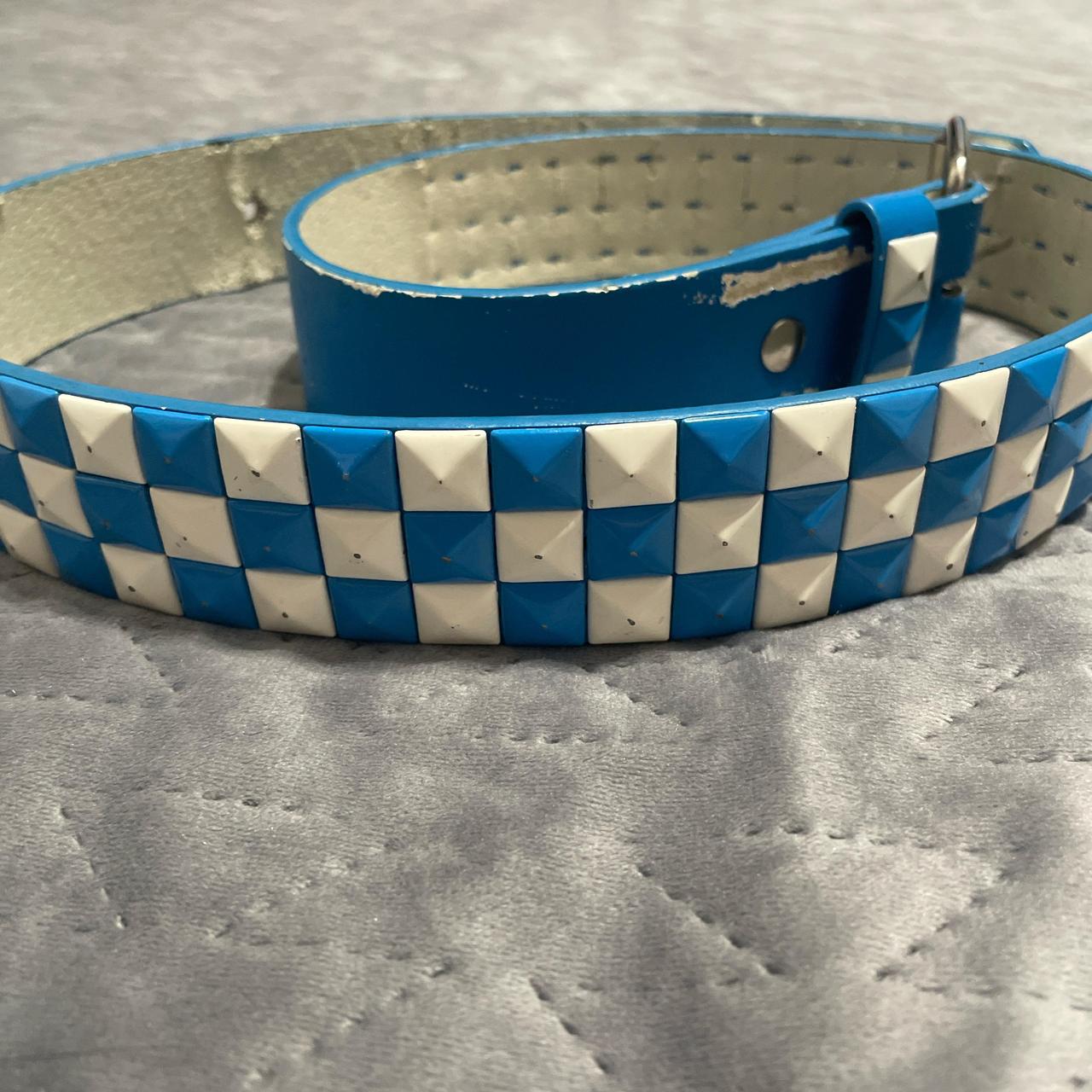 Blue and white pyramid stud belt, very used... - Depop