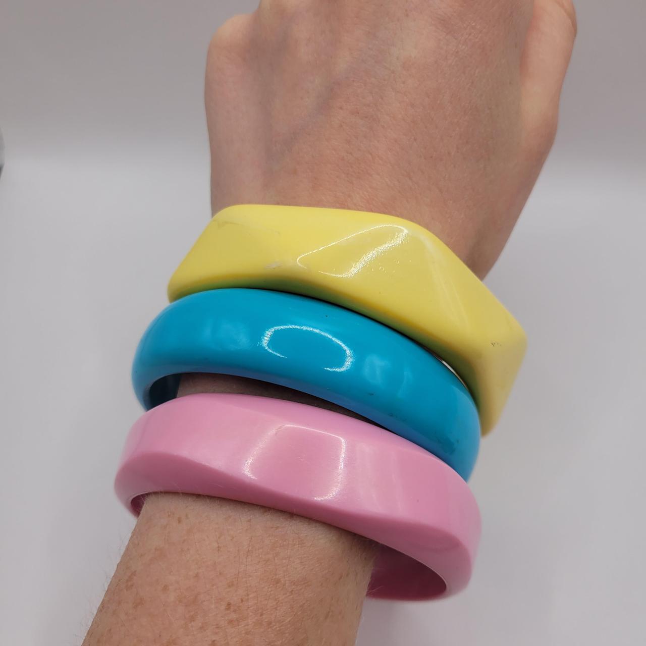 Set of 3 retro 80s bangles in pastel pink, blue, and... | Depop