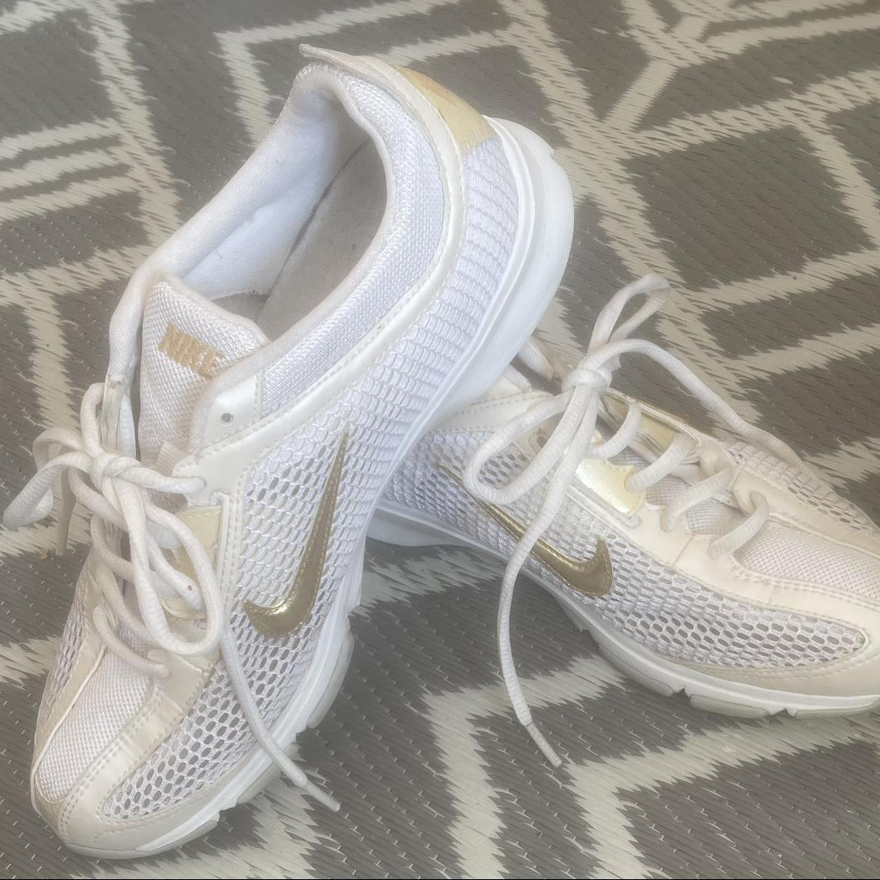 White and gold trainers size 5 Lots of life left,... - Depop