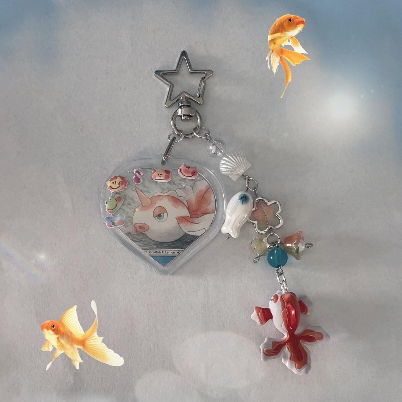 Goldeen pokemon card keychain!🐠🫧 ☆ ☆ ☆ #pokemon... - Depop