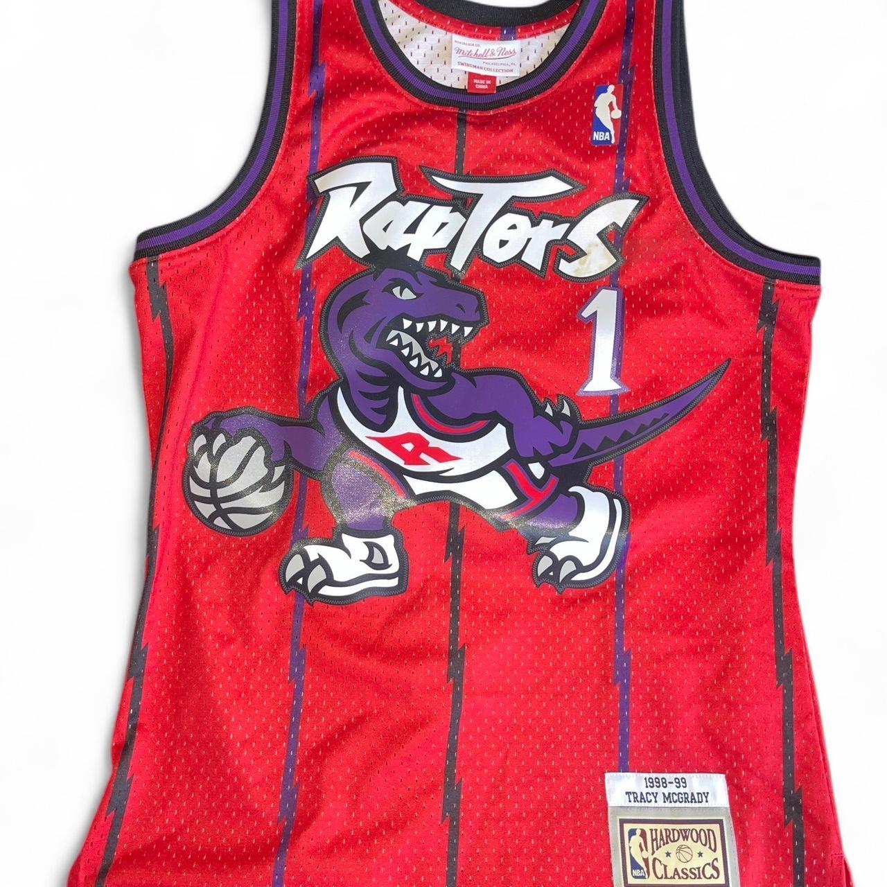 Red and purple Tracy McGrady Toronto Raptors jersey... | Depop