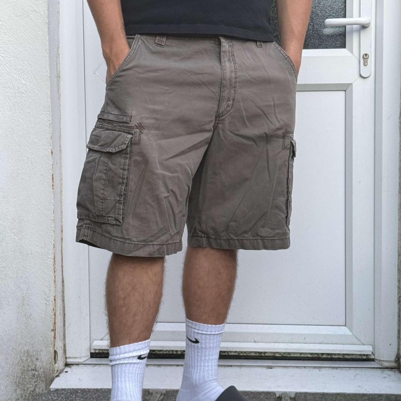 Men’s wranglers cargo jorts Item colour - khaki... | Depop