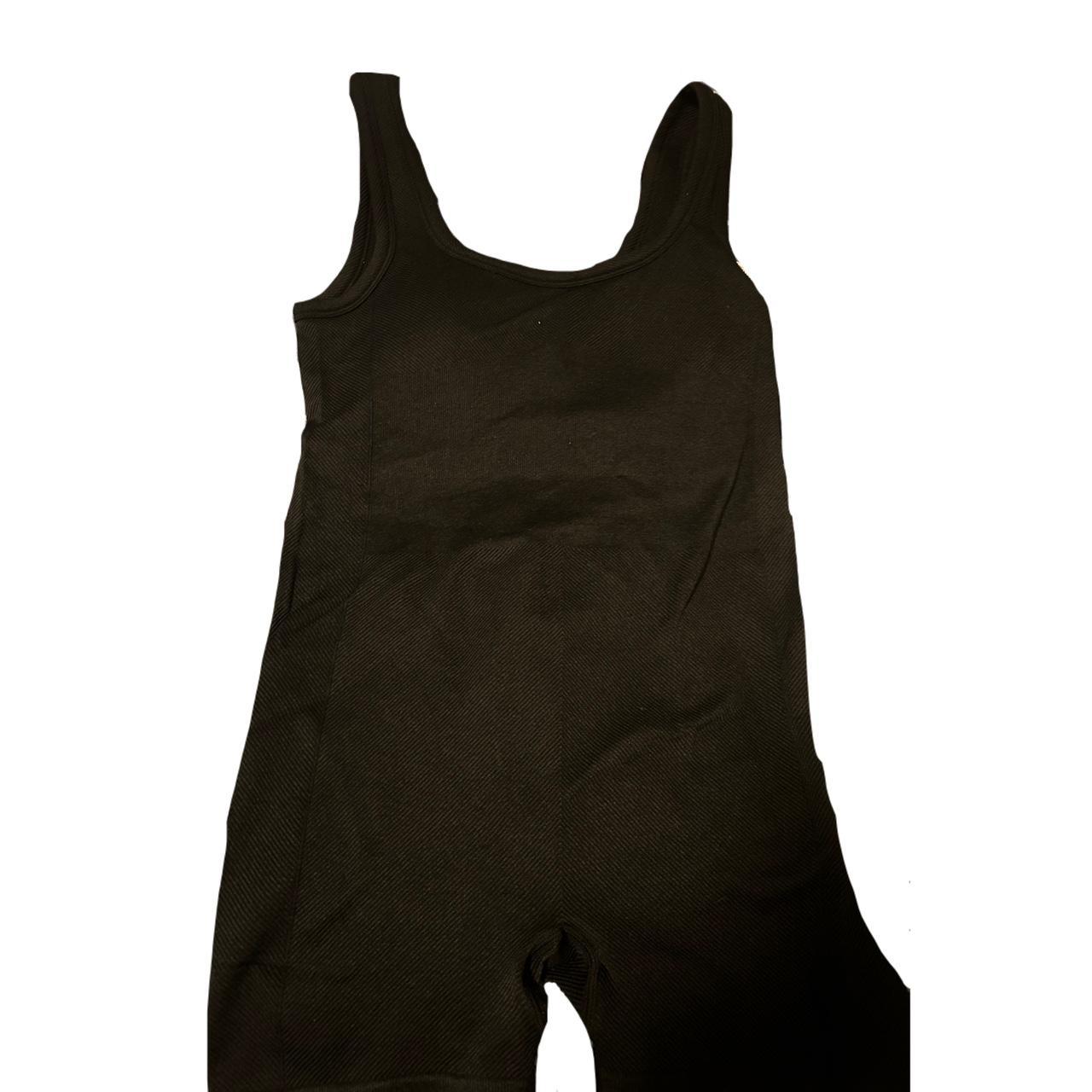 small black gym body suit never worn as didn’t fit... | Depop