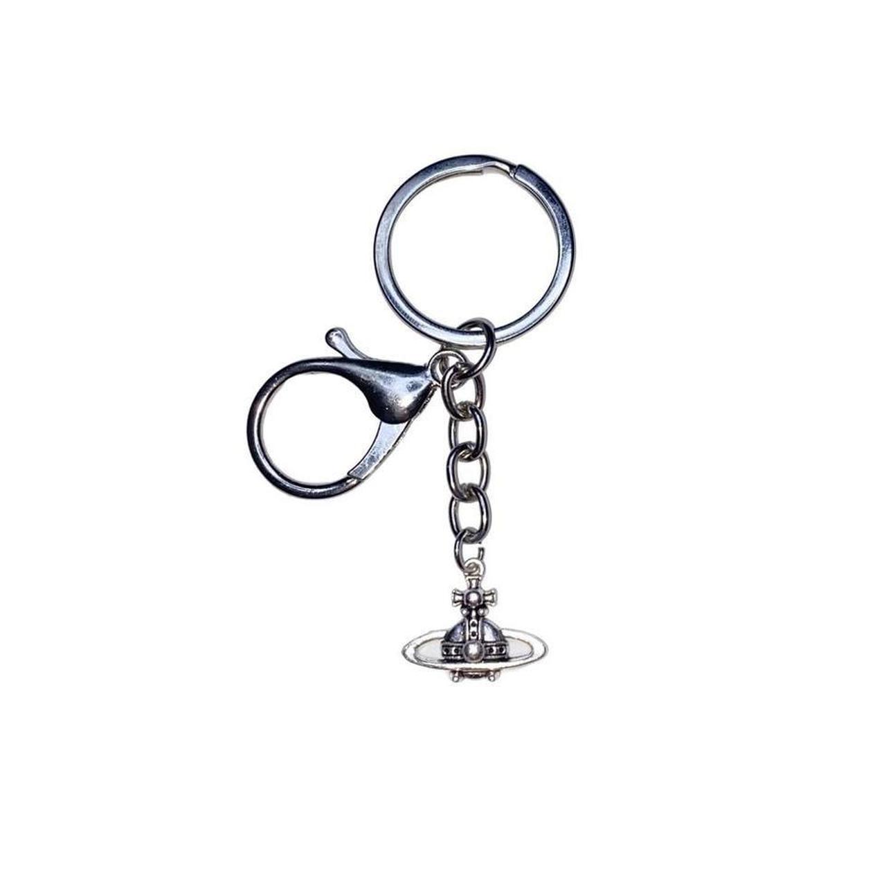 SATURN KEY CHAIN • Silver keychain with Saturn... - Depop