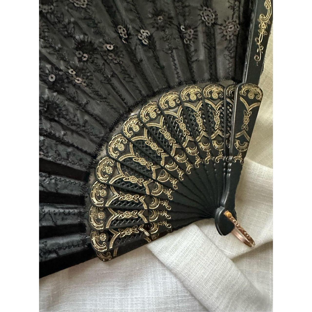 Black, sequin hand fan with gold detail - Depop