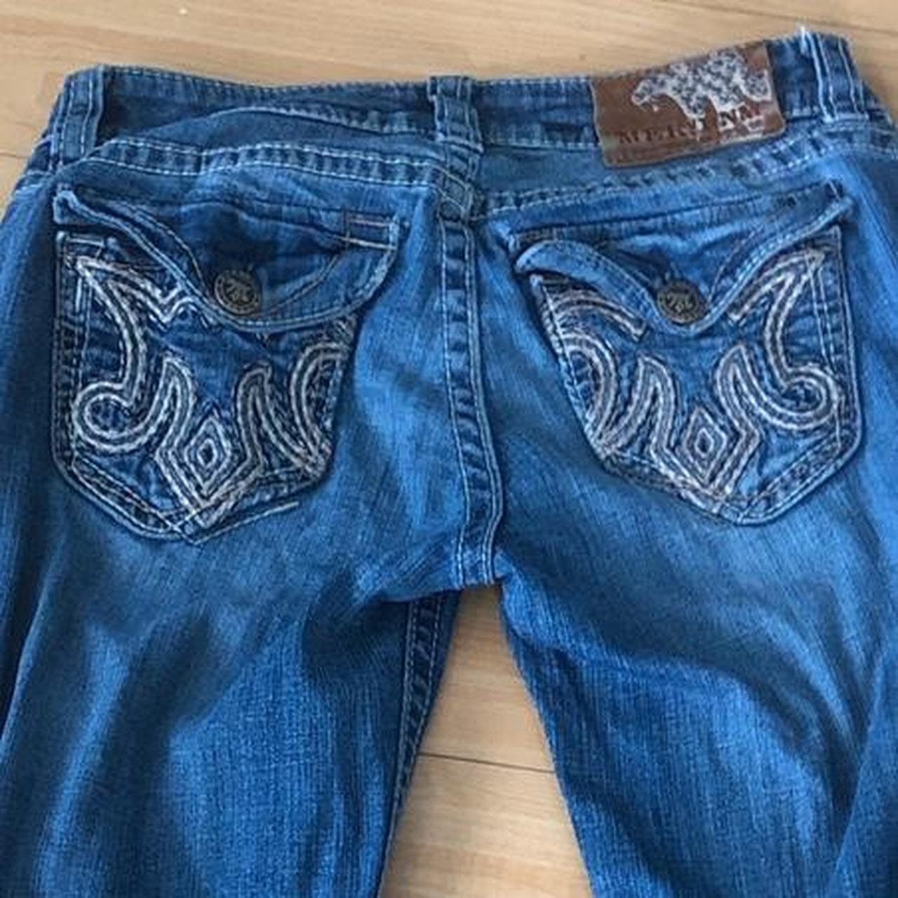 Low rise, bootcut, distressed embroidered blue jeans... - Depop