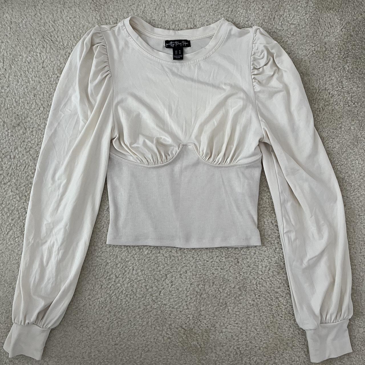 cream colored top offers welcome flattering but... - Depop