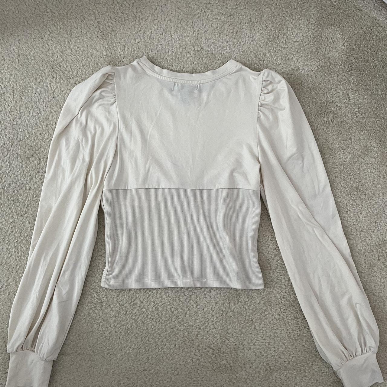 cream colored top offers welcome flattering but... - Depop