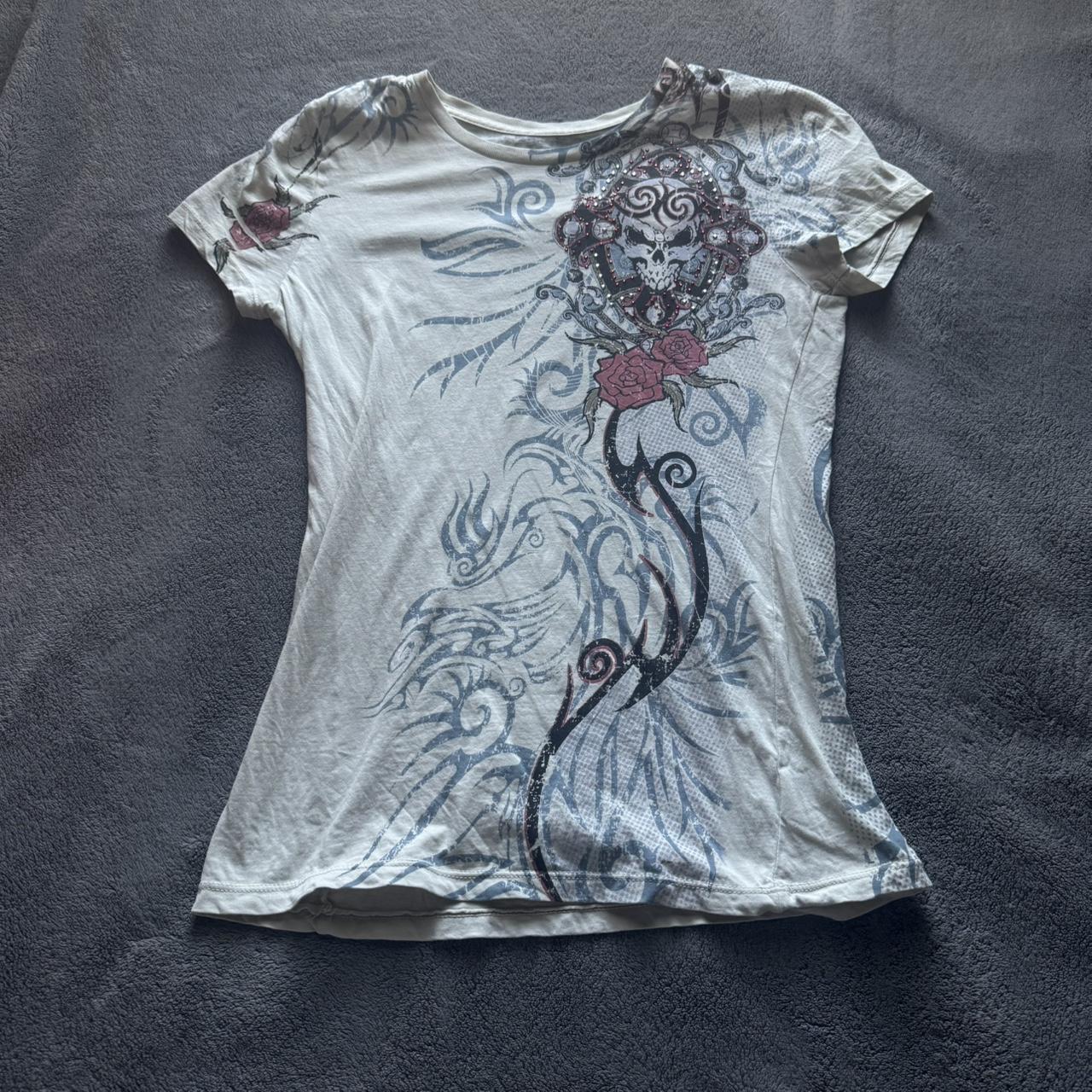 HELLA SICK BRAD BUTTER TRIBAL SKULL RHINESTONE... | Depop