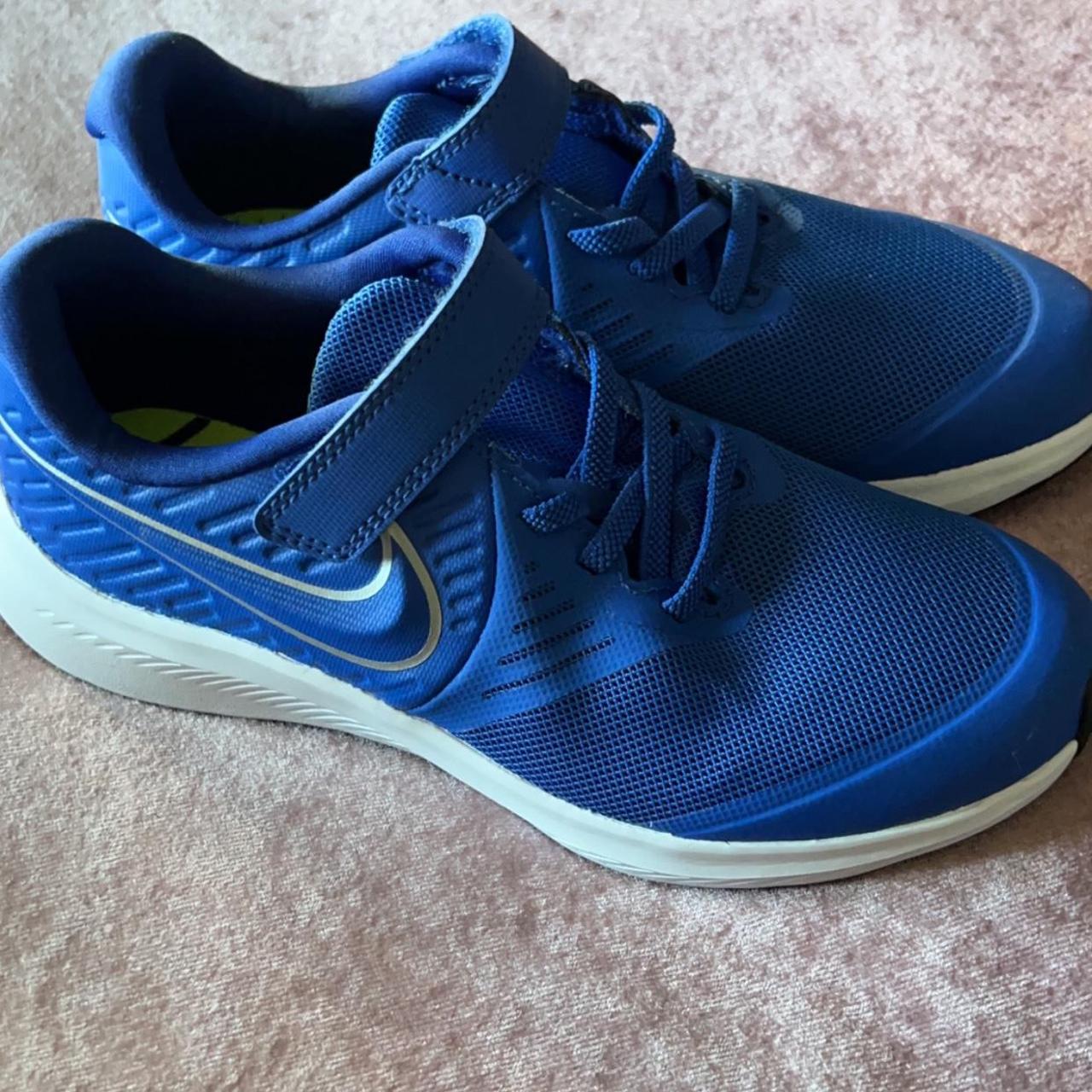 Blue Nike trainers, never been worn (no box... - Depop