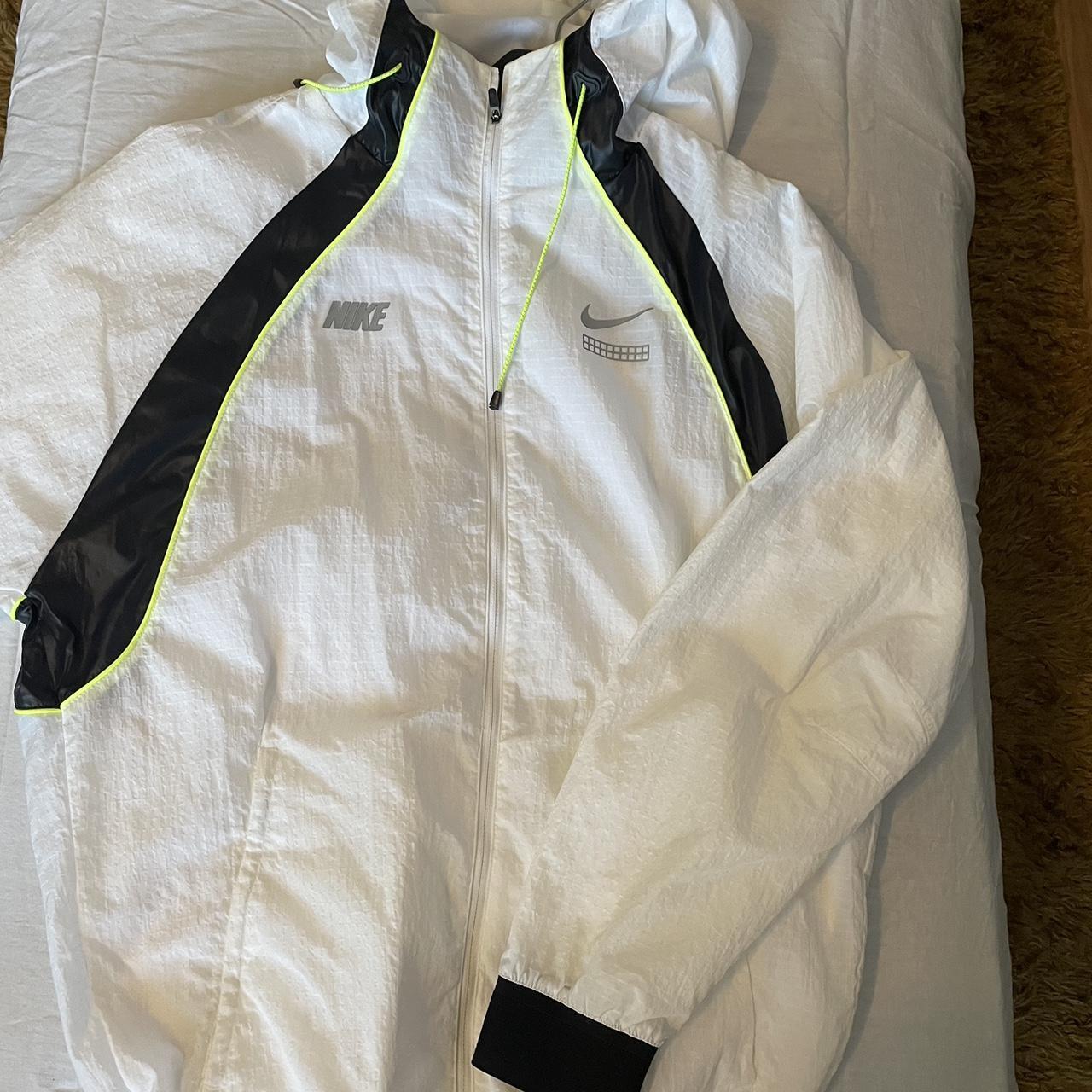 nike running jacket, uk size small but fits large,... - Depop