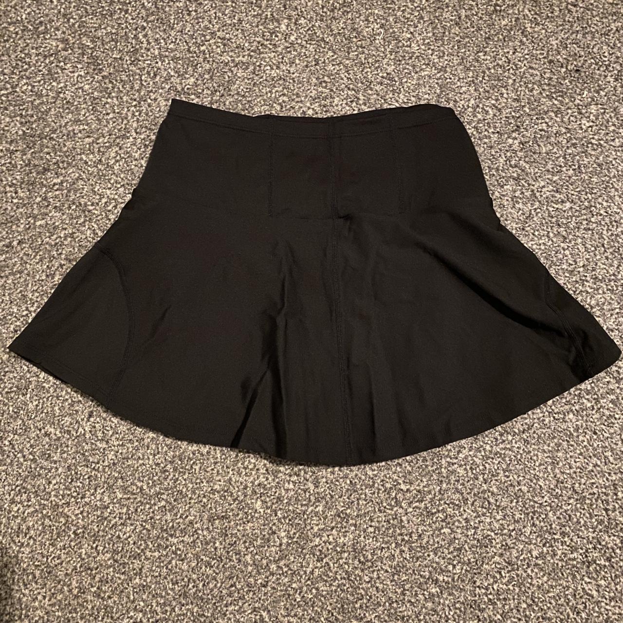 Halara flare tennis skort Pockets on both sides of... - Depop