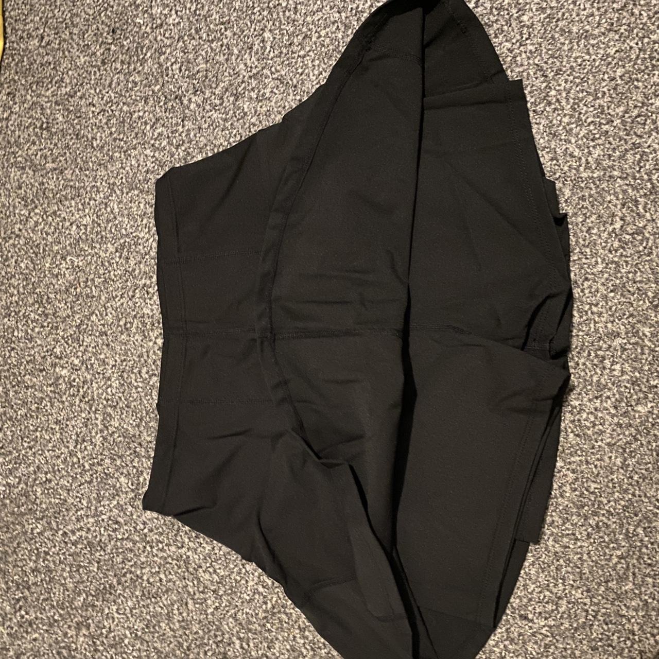 Halara flare tennis skort Pockets on both sides of... - Depop