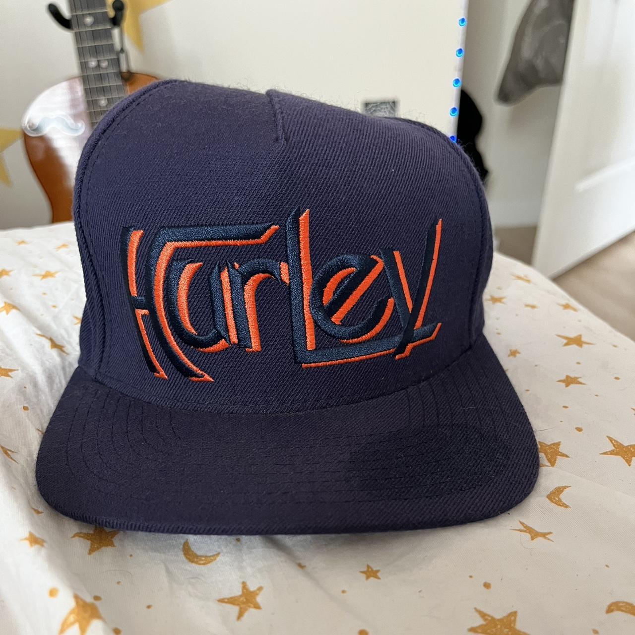 Navy and orange Hurley snapback hat | Depop