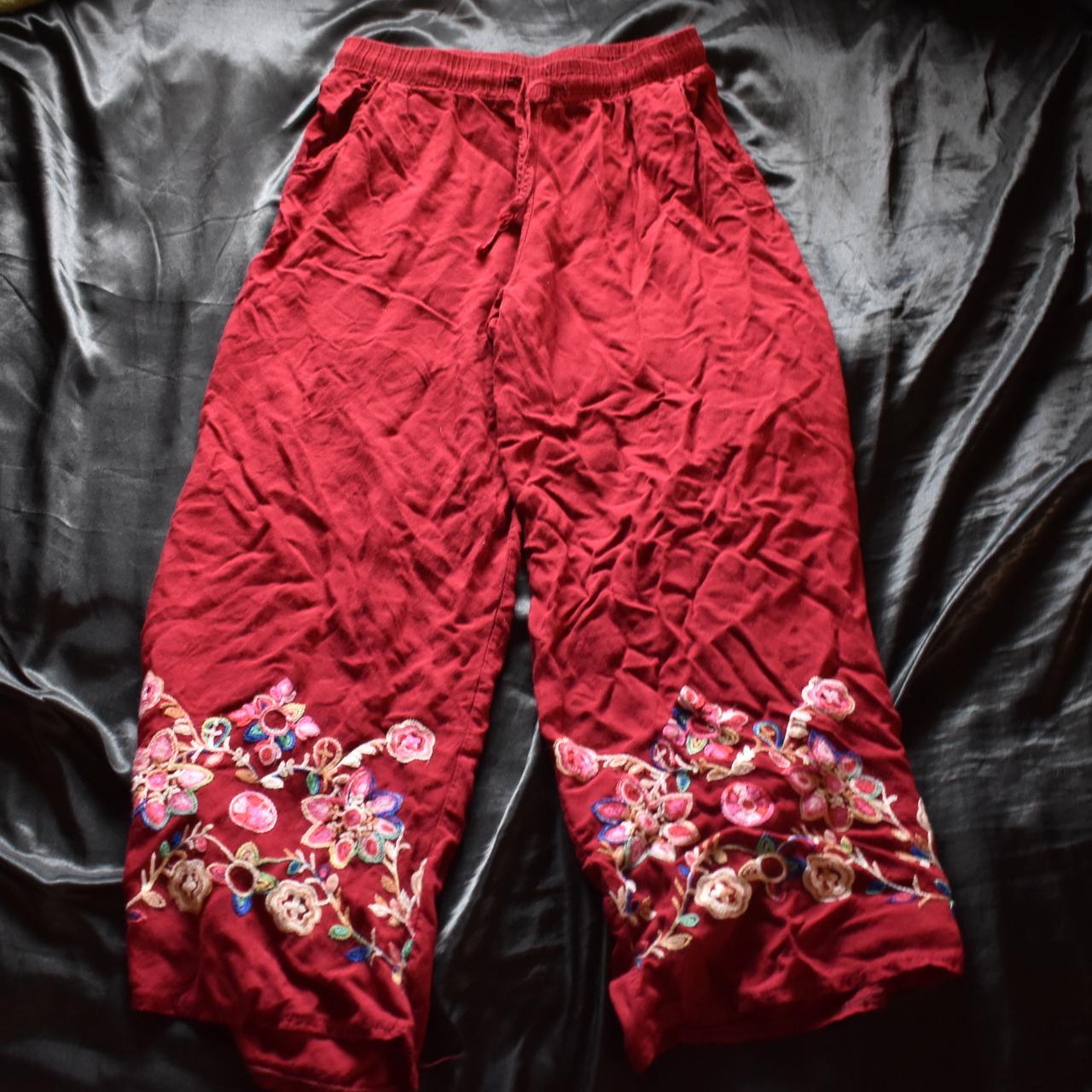 Red/Maroon Flowy Pants Flower design on... - Depop