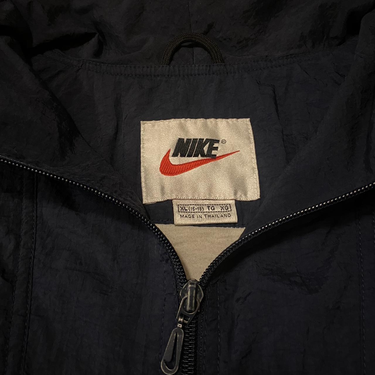Vintage Nike zip up windbreaker. Has multiple flaws... - Depop