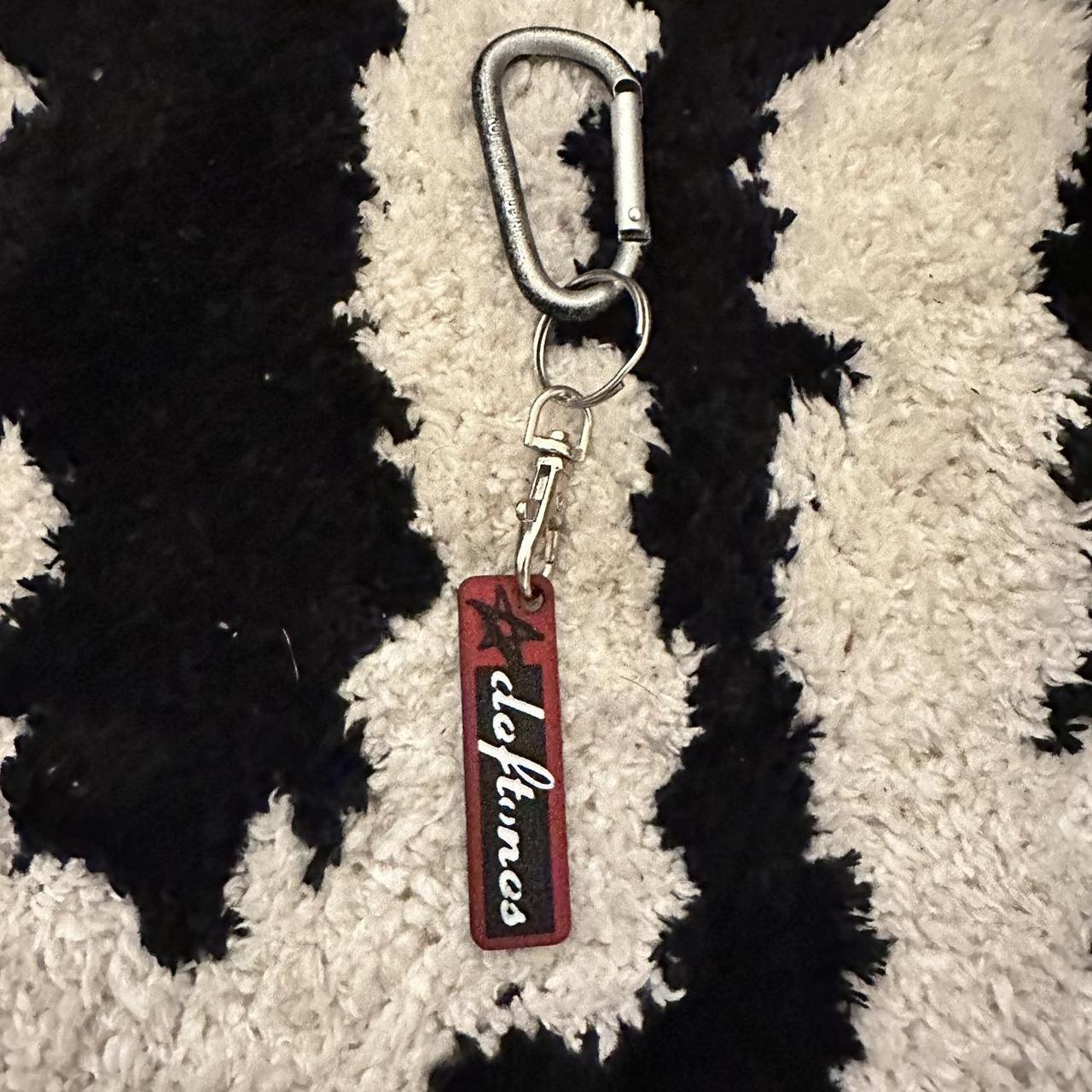 red deftones charms key chain high quality... - Depop