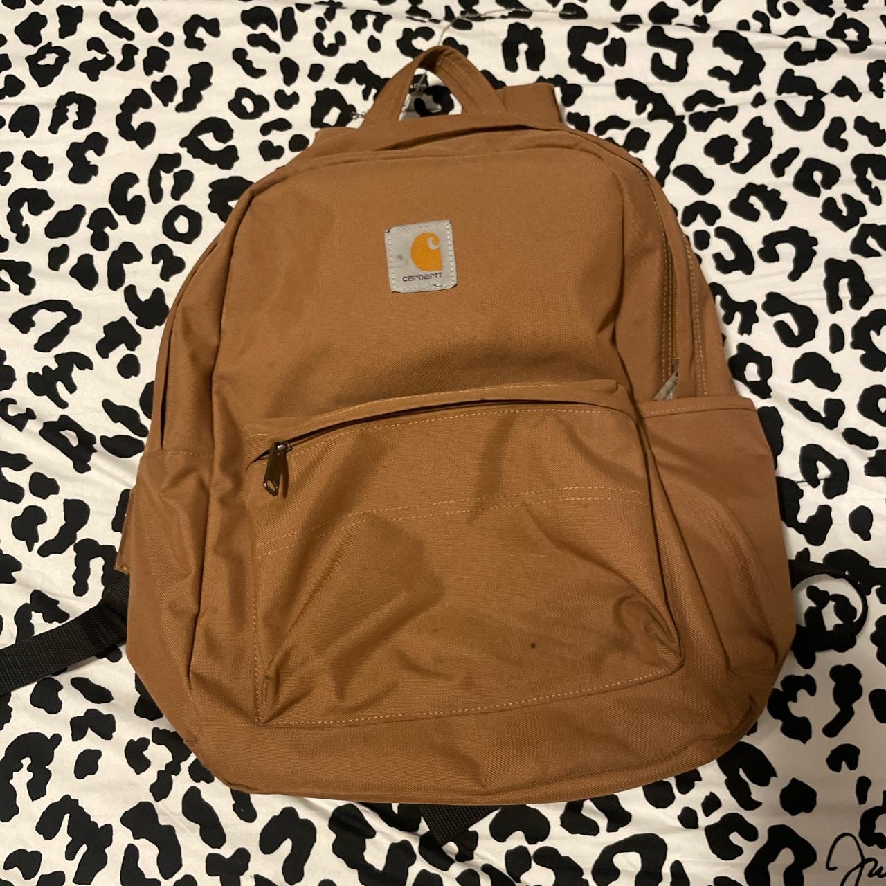 Carhartt Tan & black backpack. In very great... - Depop