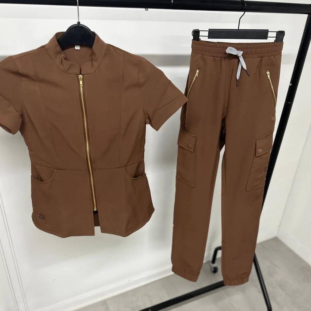 Brown scrub set with pockets, zipper front, and... - Depop