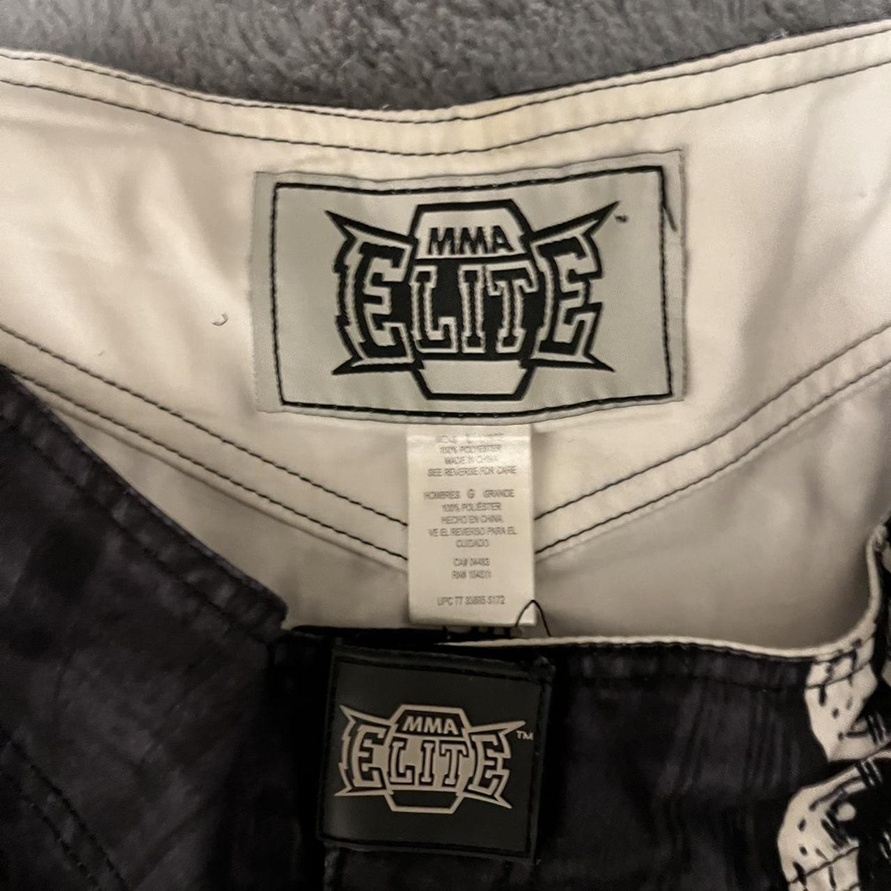 Men's Black and White Swimsuit-one-piece | Depop