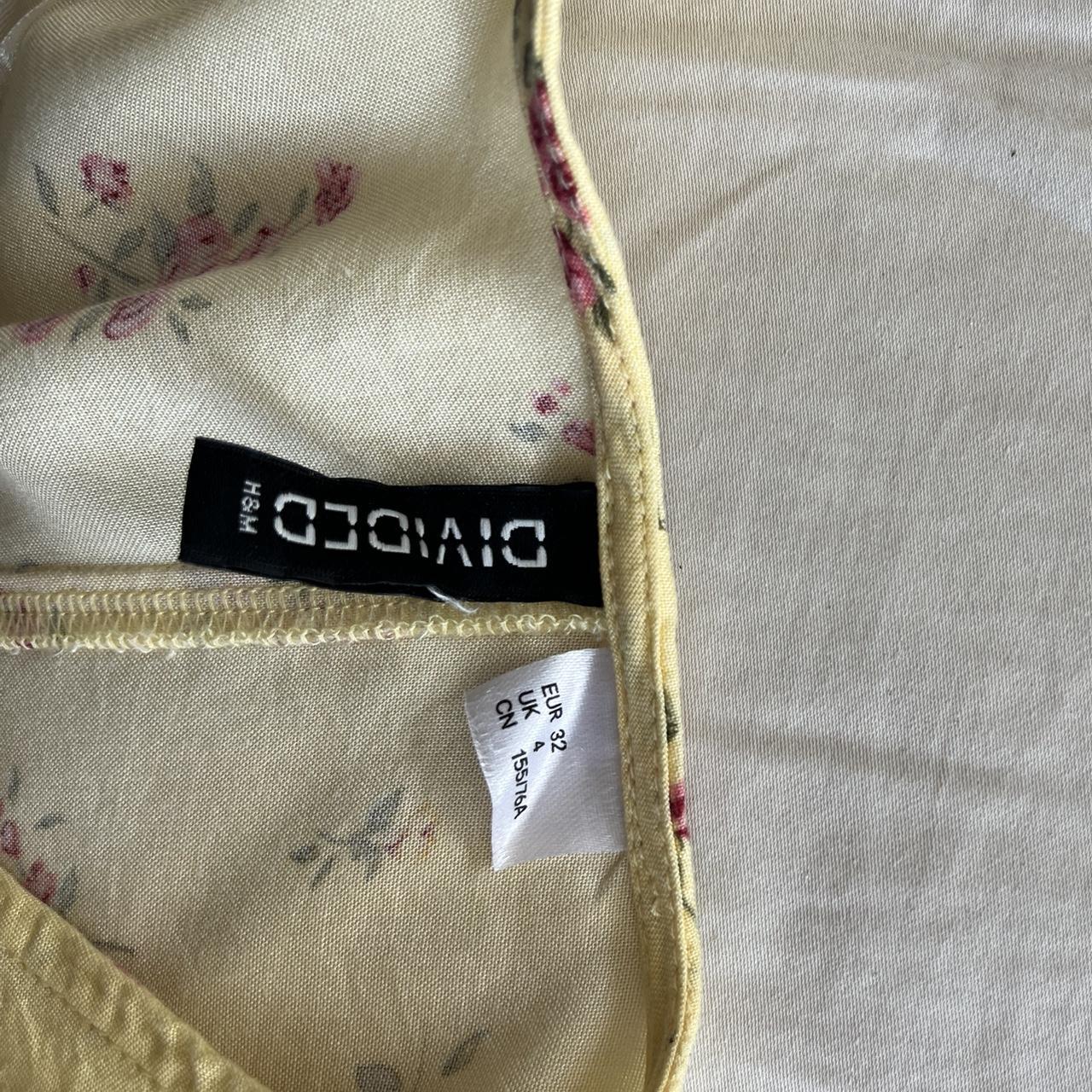 Divided H&M yellow floral mini dress, size 4 (fits... - Depop