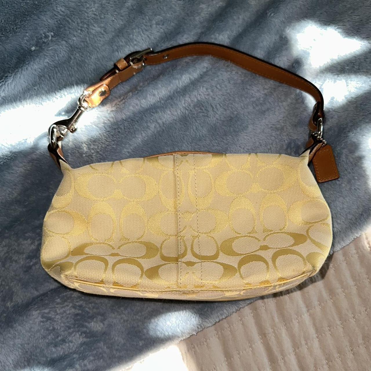 Vintage mini coach handbag. Beautiful buttery yellow... - Depop